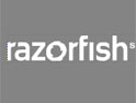 Razorfish losses narrow