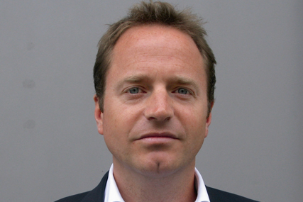 23red poaches CHI director Tom Huxtable