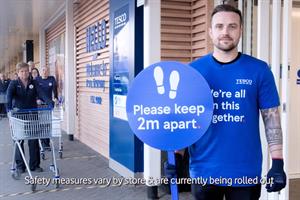 Tesco ad promotes in-store social distancing
