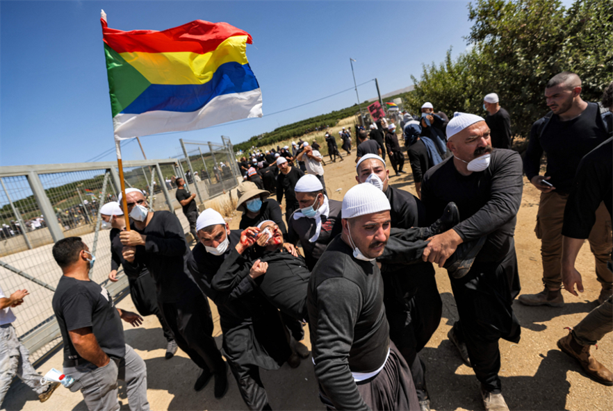 Violence flares at Druze Arab protests against wind power in Israel ...