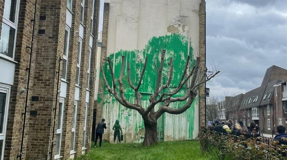 Banksy tree mural raises awareness before being defaced with white ...